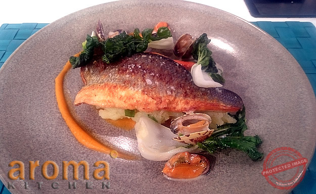 Pan seared sea bass with mussel and clam veloute and pok choy - Aceline